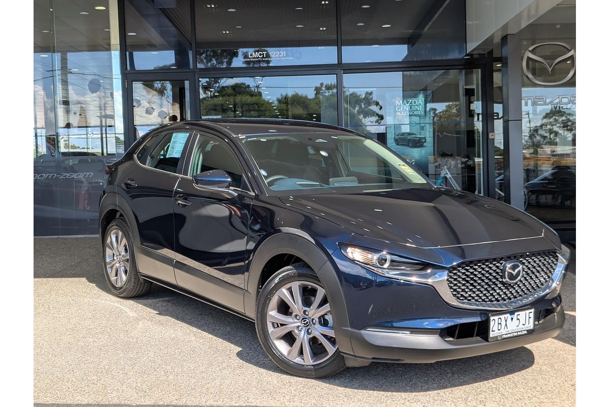SOLD 2024 Mazda CX-30 G20 Evolve in Deep Crystal Blue 42M | Demo SUV ...